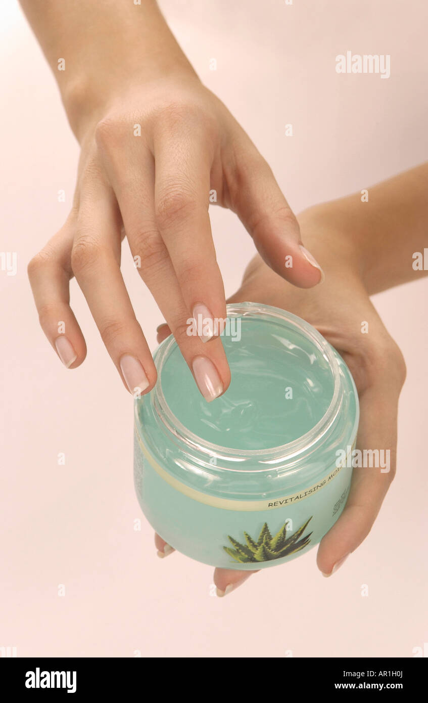 Woman applying a gel Stock Photo - Alamy