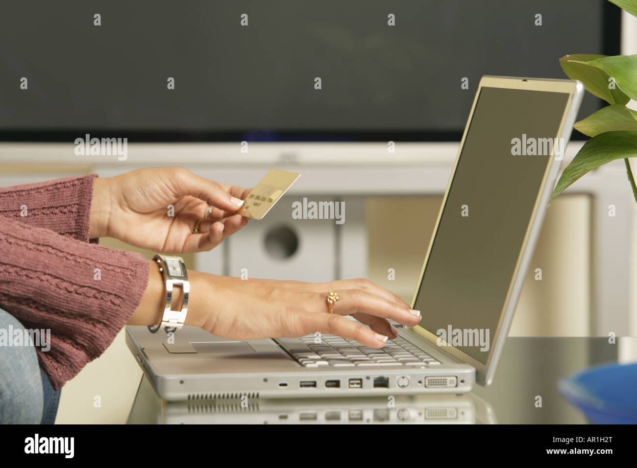 Lady busy in online transaction Stock Photo - Alamy