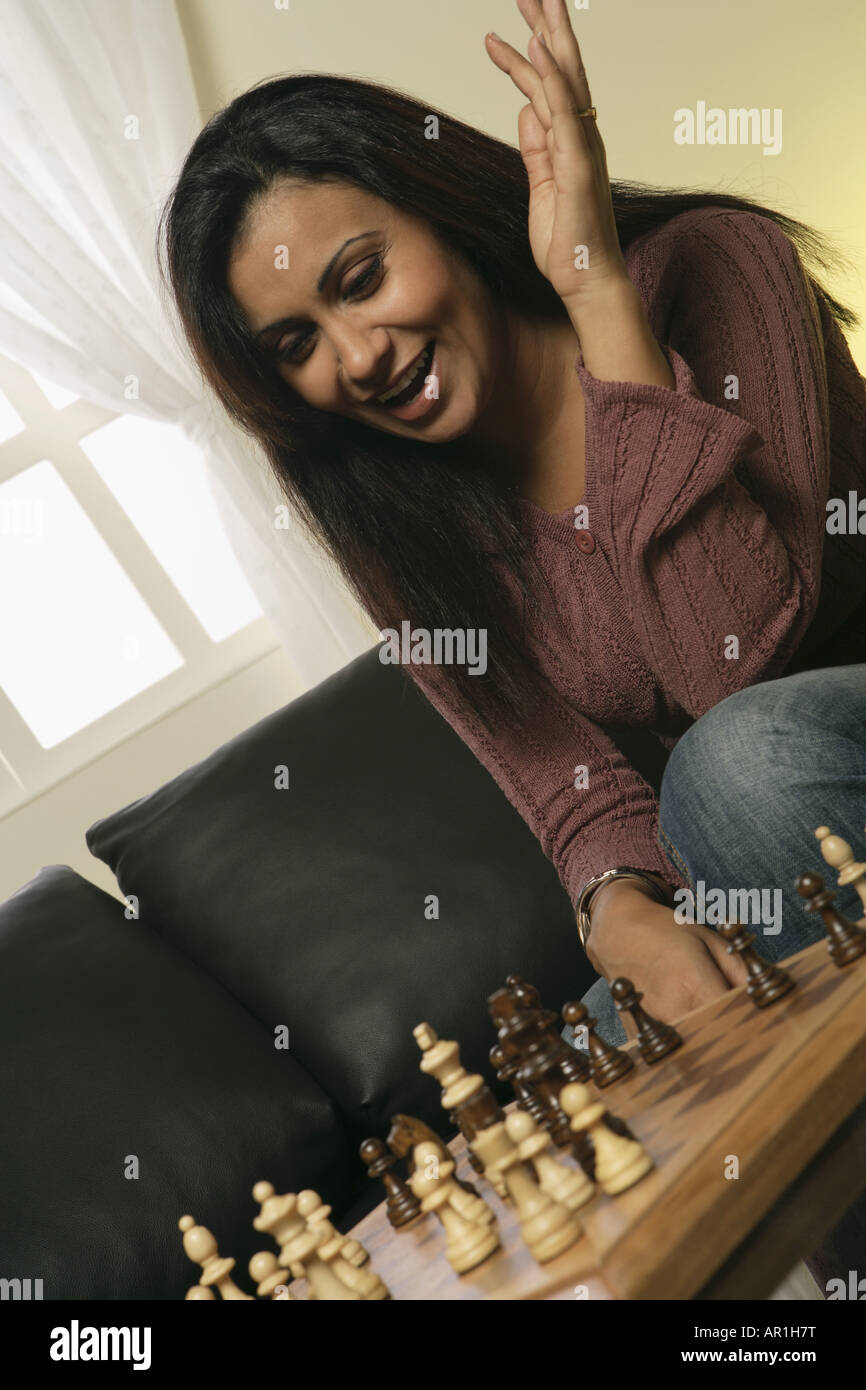 Ladies playing a chess Stock Photo - Alamy