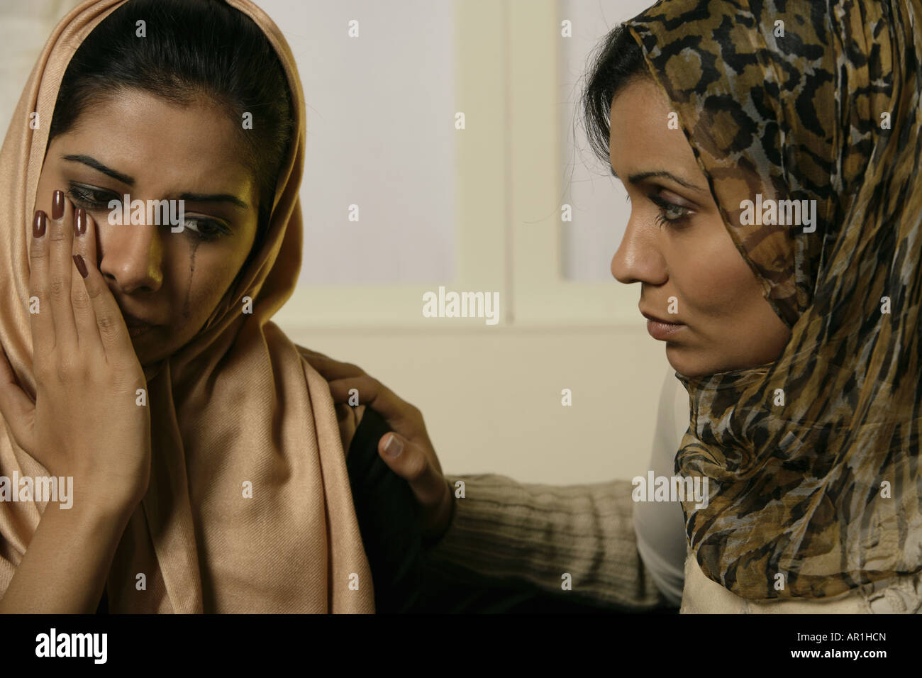 Lady cries with her friend Stock Photo - Alamy