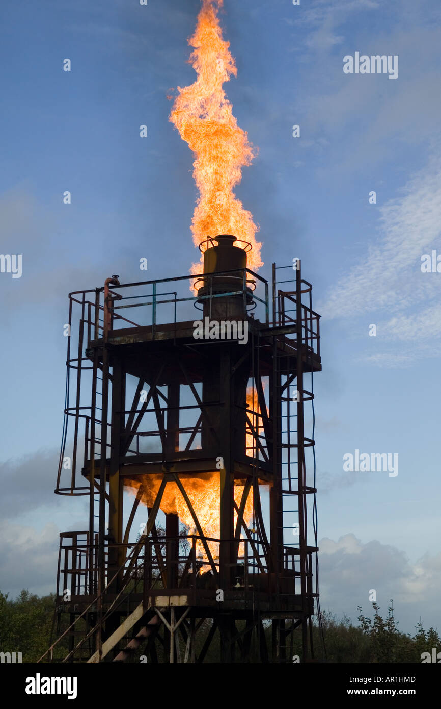 Intense roaring fire in industrial chemical plant storage engulfed hi ...