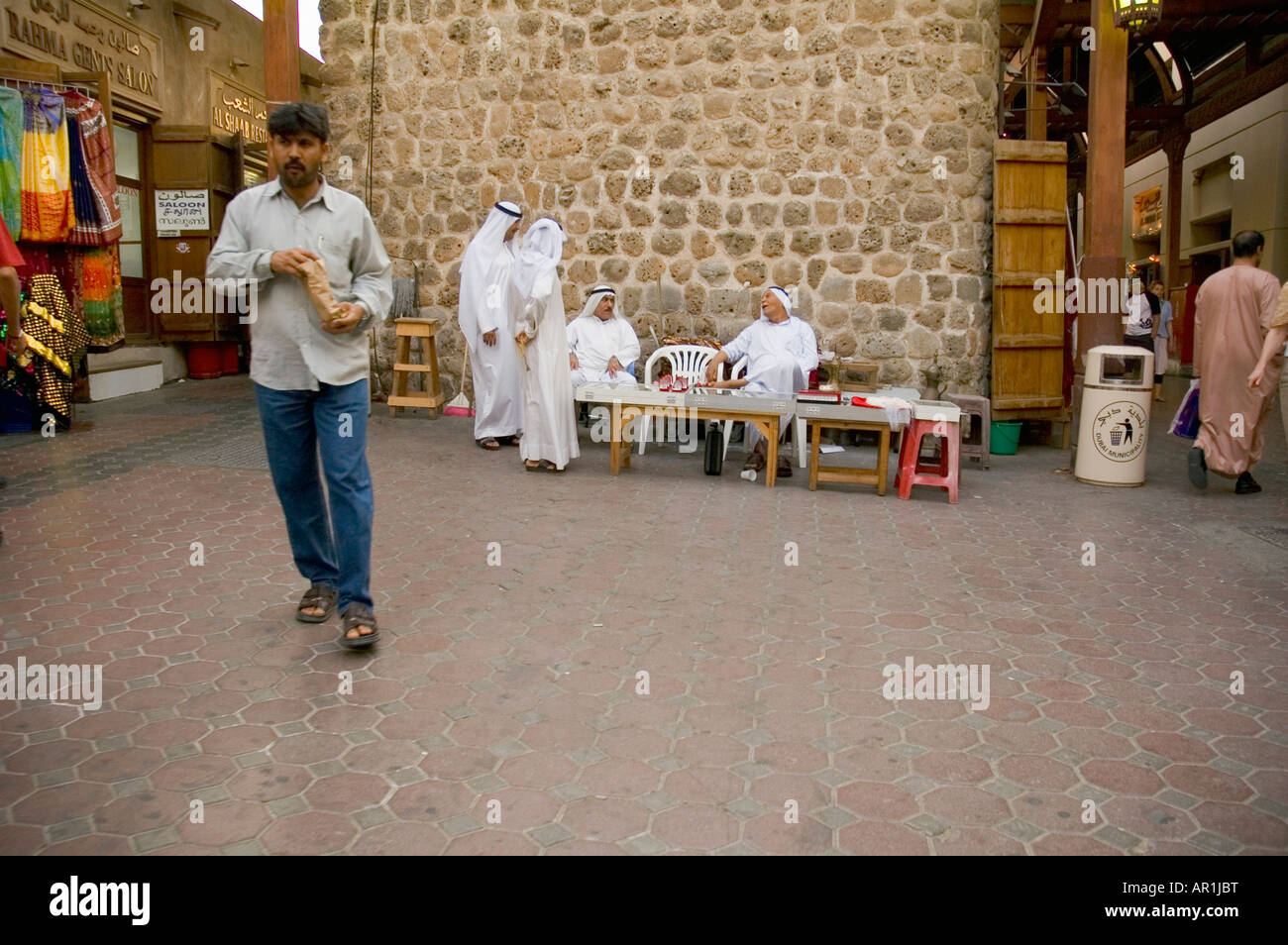 Arab man selling novelty items Stock Photo - Alamy