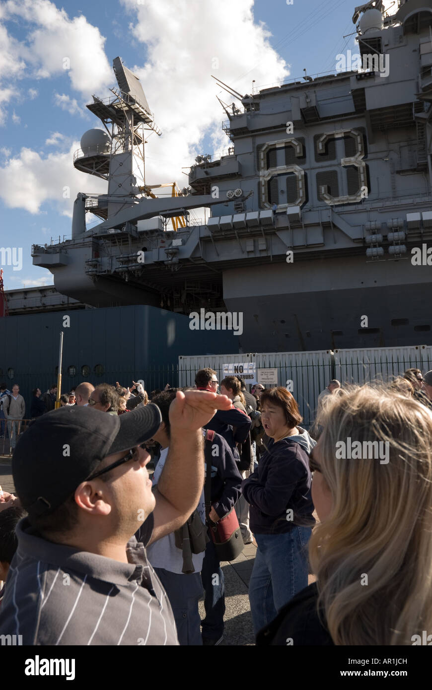 Members of the public admire the impressive sight of US super carrier ...