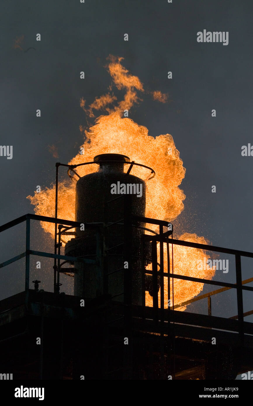 intense roaring fire in industrial chemical storage Stock Photo - Alamy