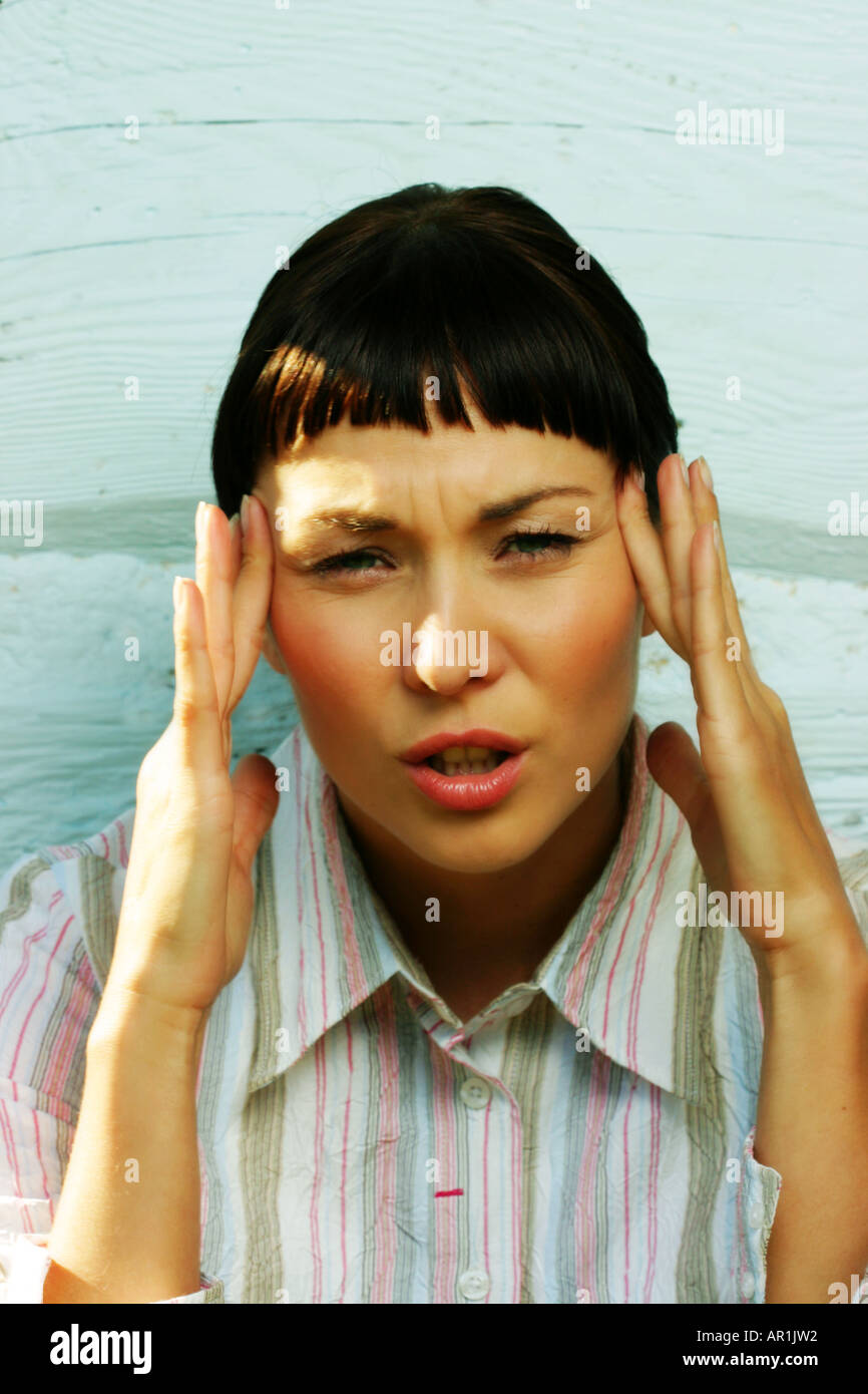 indoor studio close up woman 25 30 portrait brunette forelock massage ...