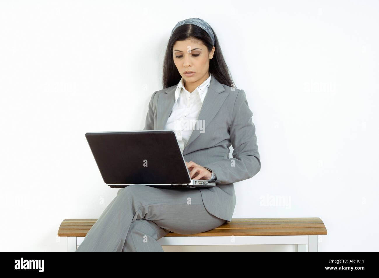 Arab Lady with computer Stock Photo - Alamy