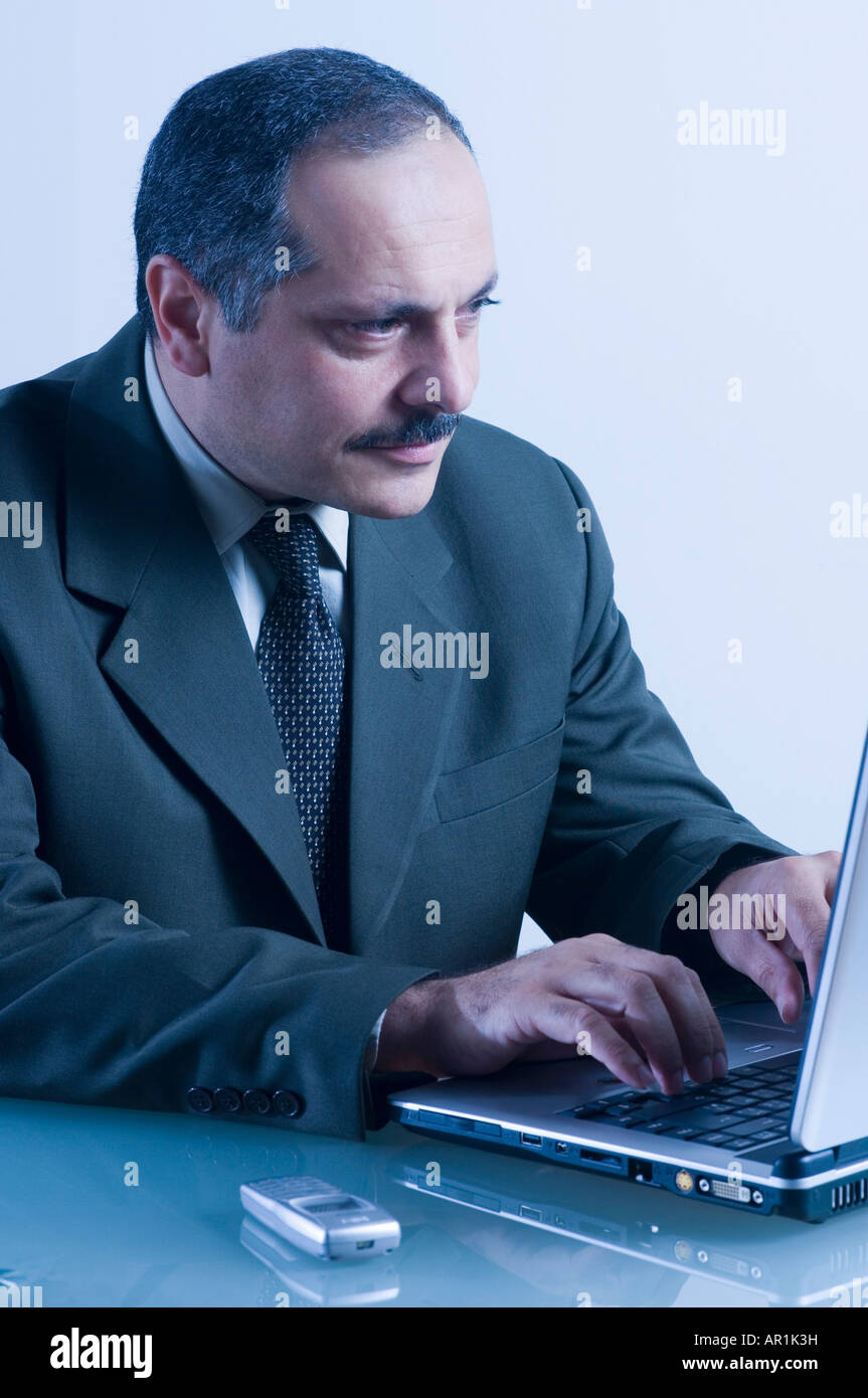 Business man on the computer Stock Photo - Alamy
