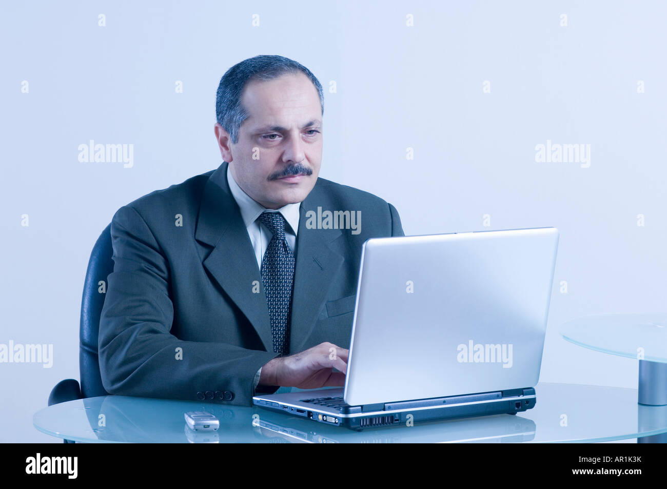 Business man at the computer Stock Photo - Alamy