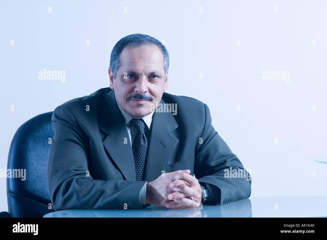 Business man at his desk Stock Photo - Alamy