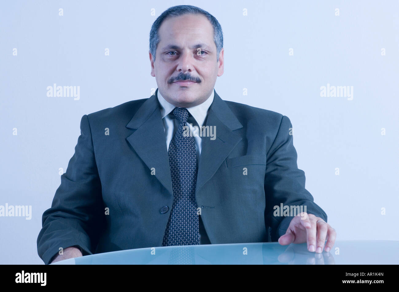 Business man at his desk Stock Photo - Alamy