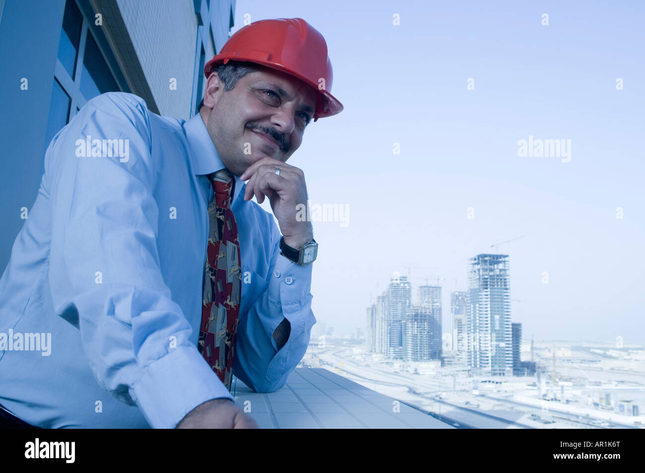 Worker in the side of a building hi-res stock photography and images ...