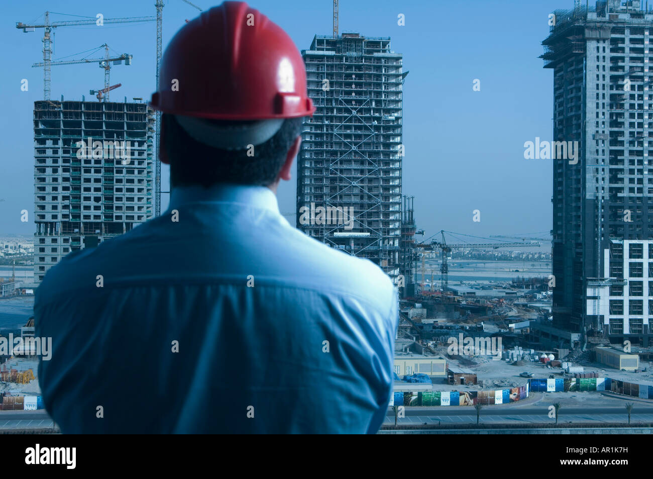Engineer looks at the building constructions in Dubai Stock Photo - Alamy