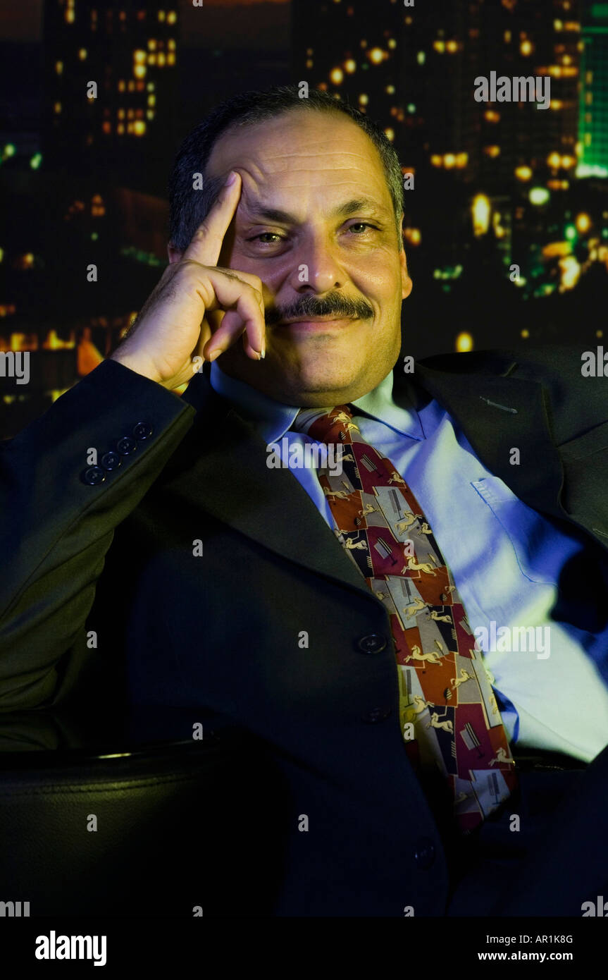 Portrait of a Senior Executive relaxing Stock Photo - Alamy