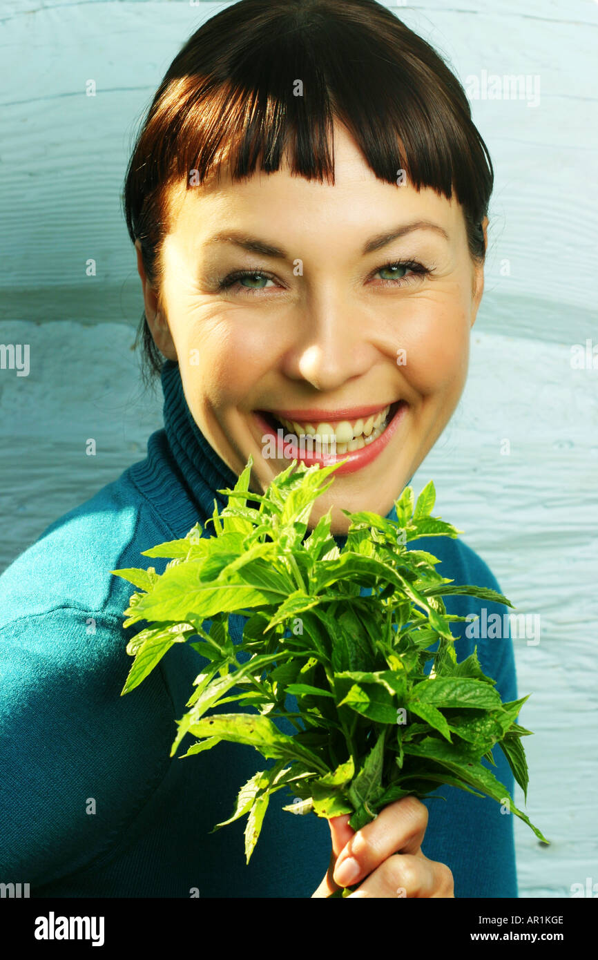 indoor studio close up woman 25 30 portrait brunette forelock hold ...
