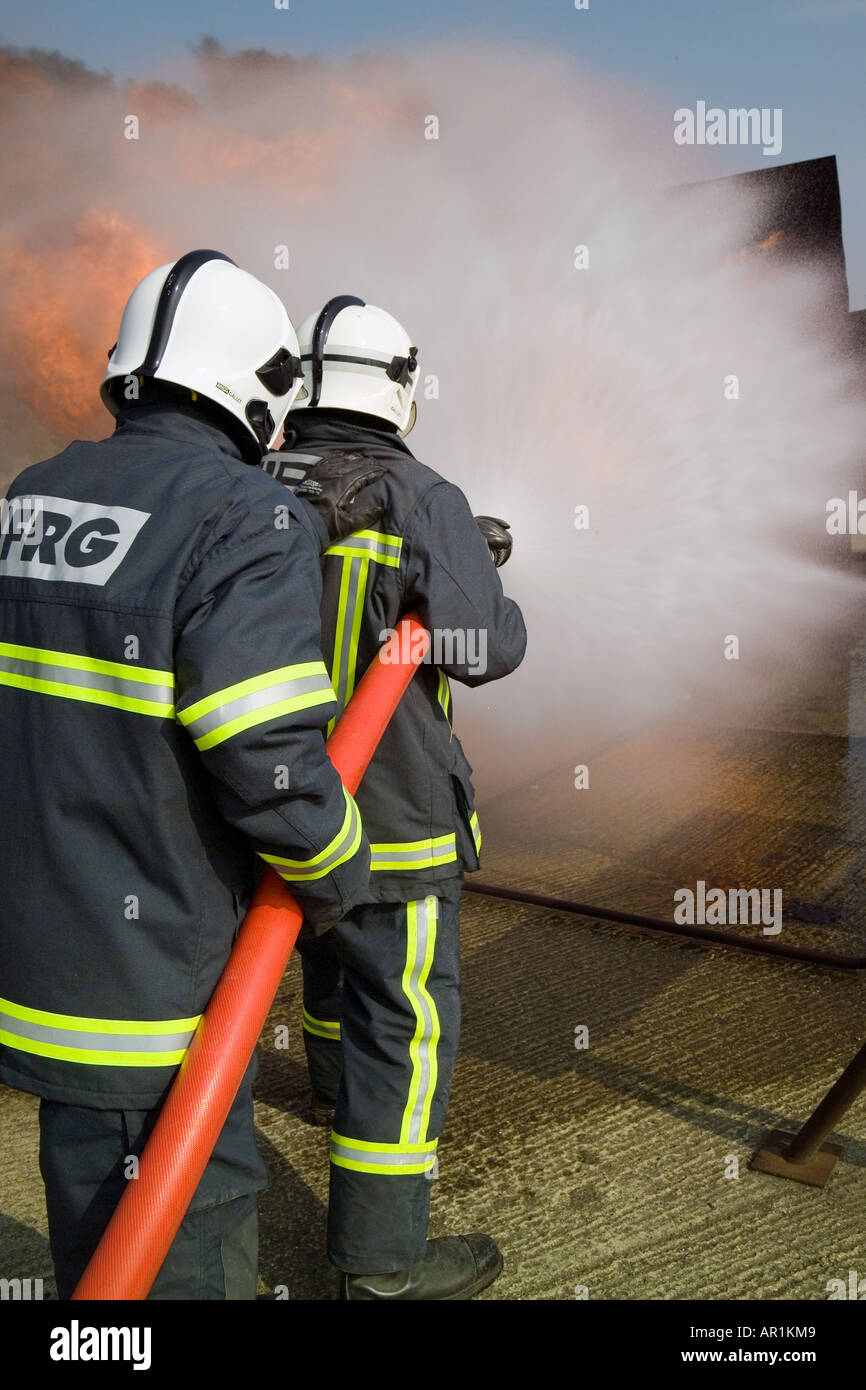 Fire fighters training with shield hi-res stock photography and images ...