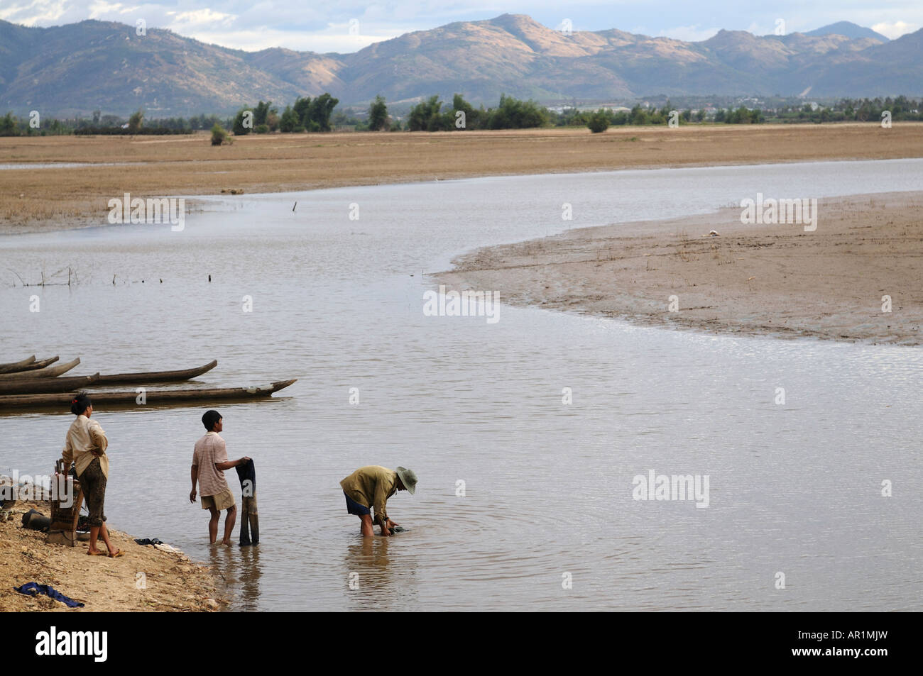 Wash your clothes in river hi-res stock photography and images - Alamy