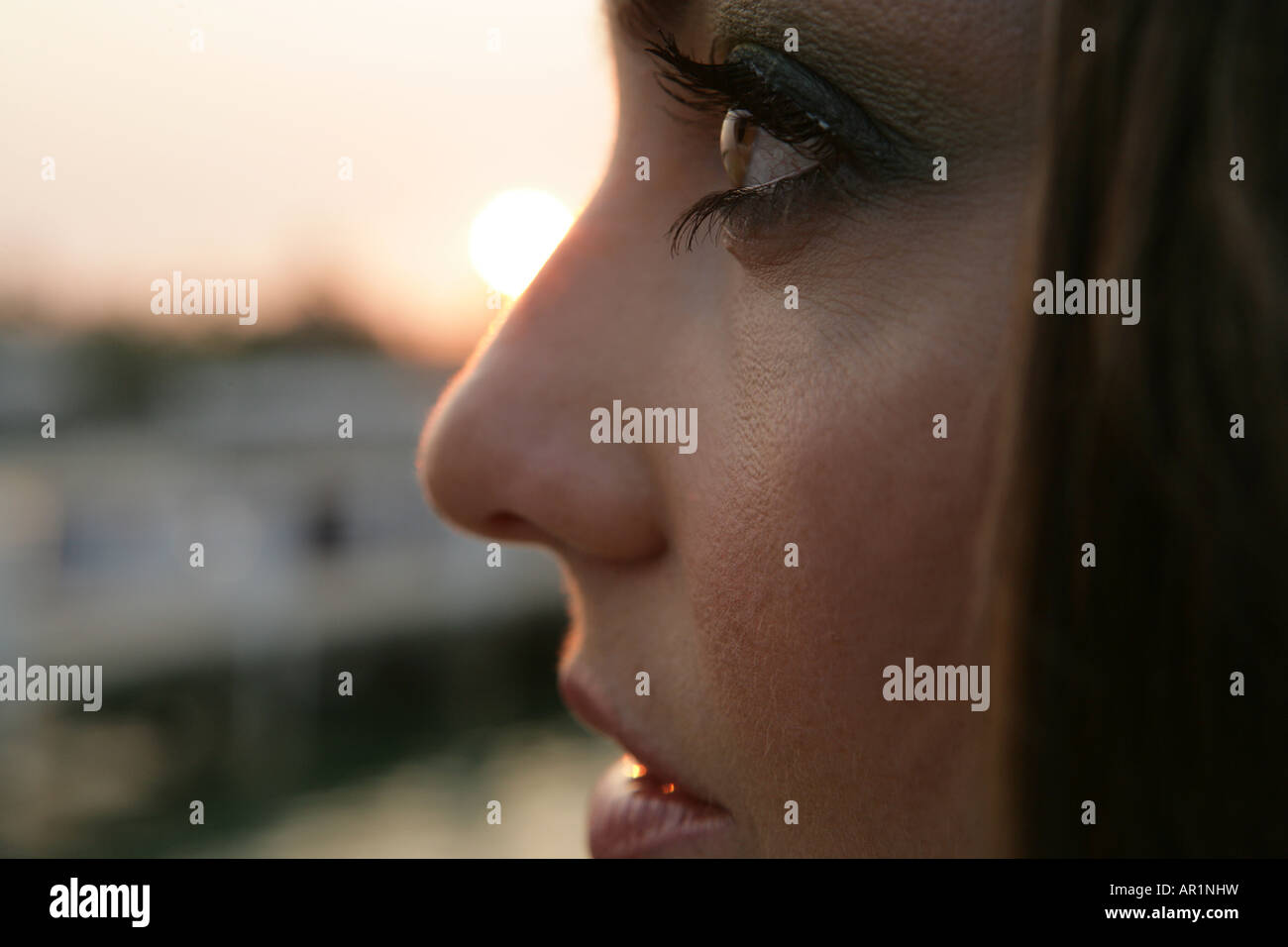 Close-up profile of young woman's face Stock Photo - Alamy