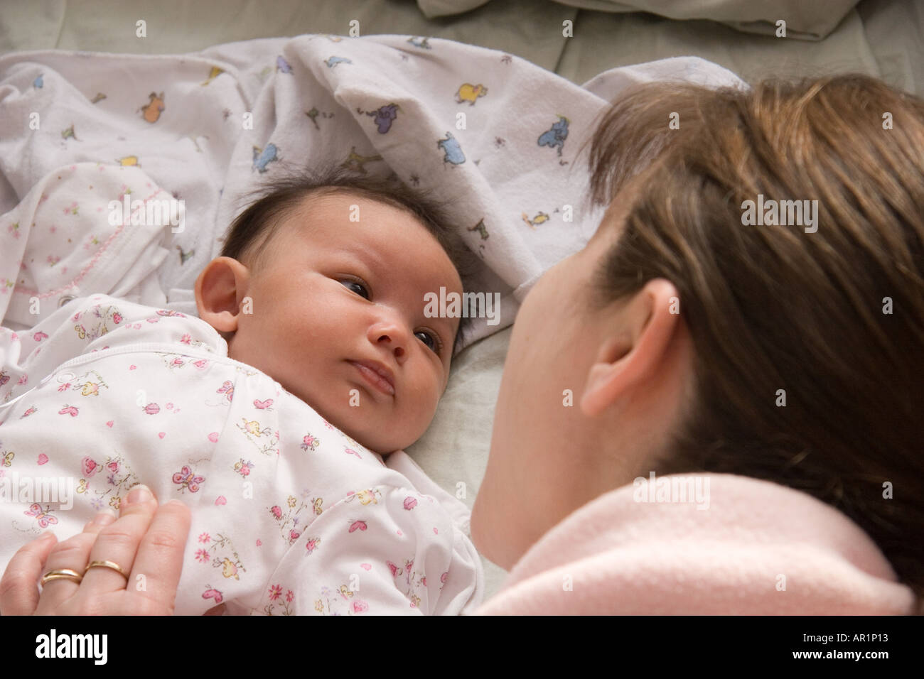 One month old infant and mother Stock Photo - Alamy