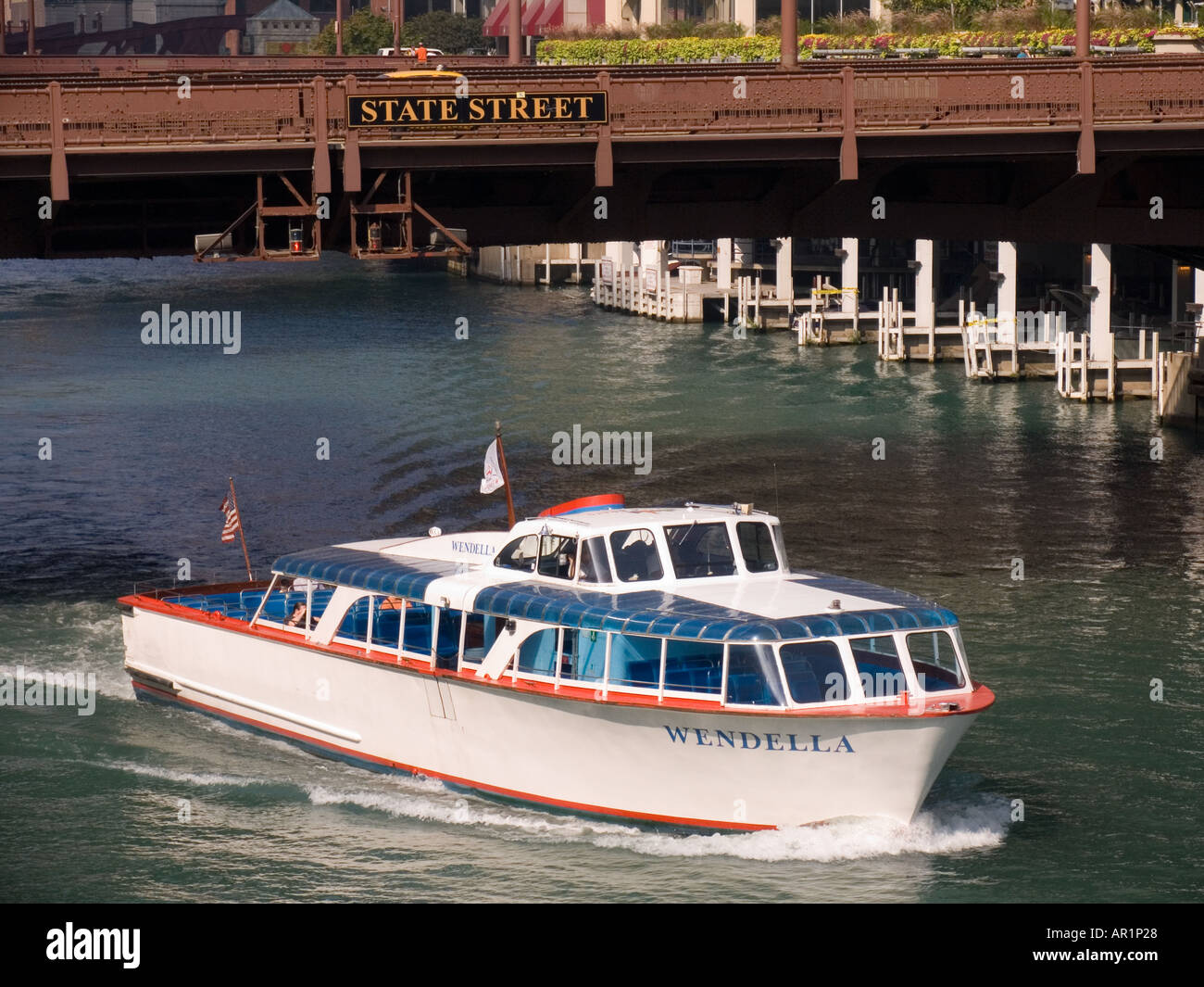 Wendella boat passing under State Street bridge on the Chicago River ...