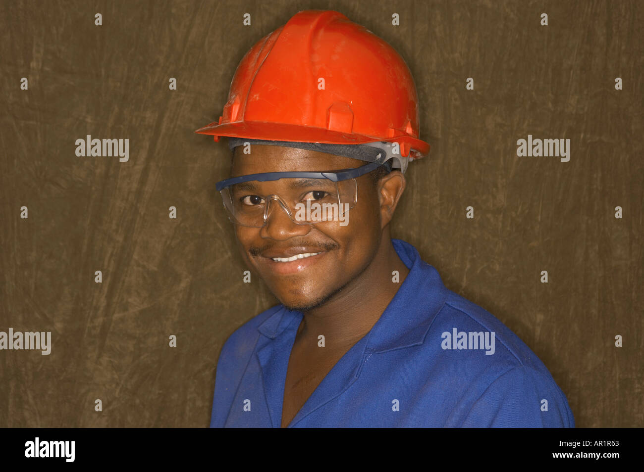 Construction worker with hard hat Stock Photo - Alamy
