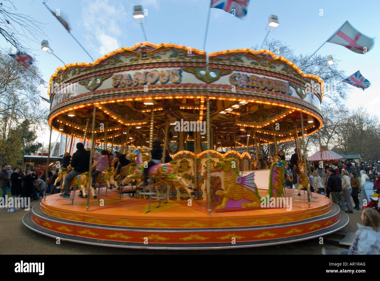 Horizontal wide angle of people riding on an old fashioned traditional ...