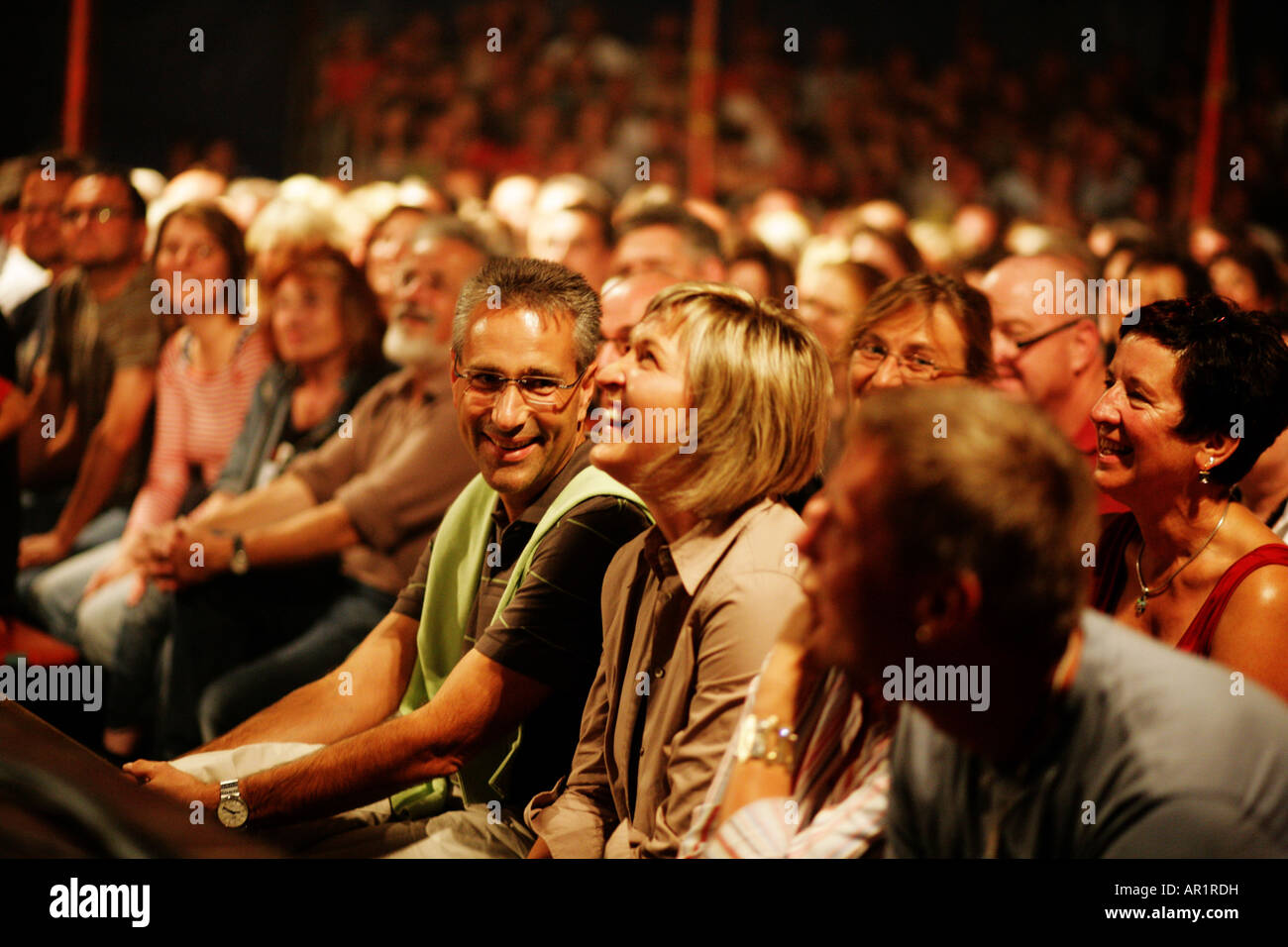 Audience watching a show in a small theatre Stock Photo - Alamy