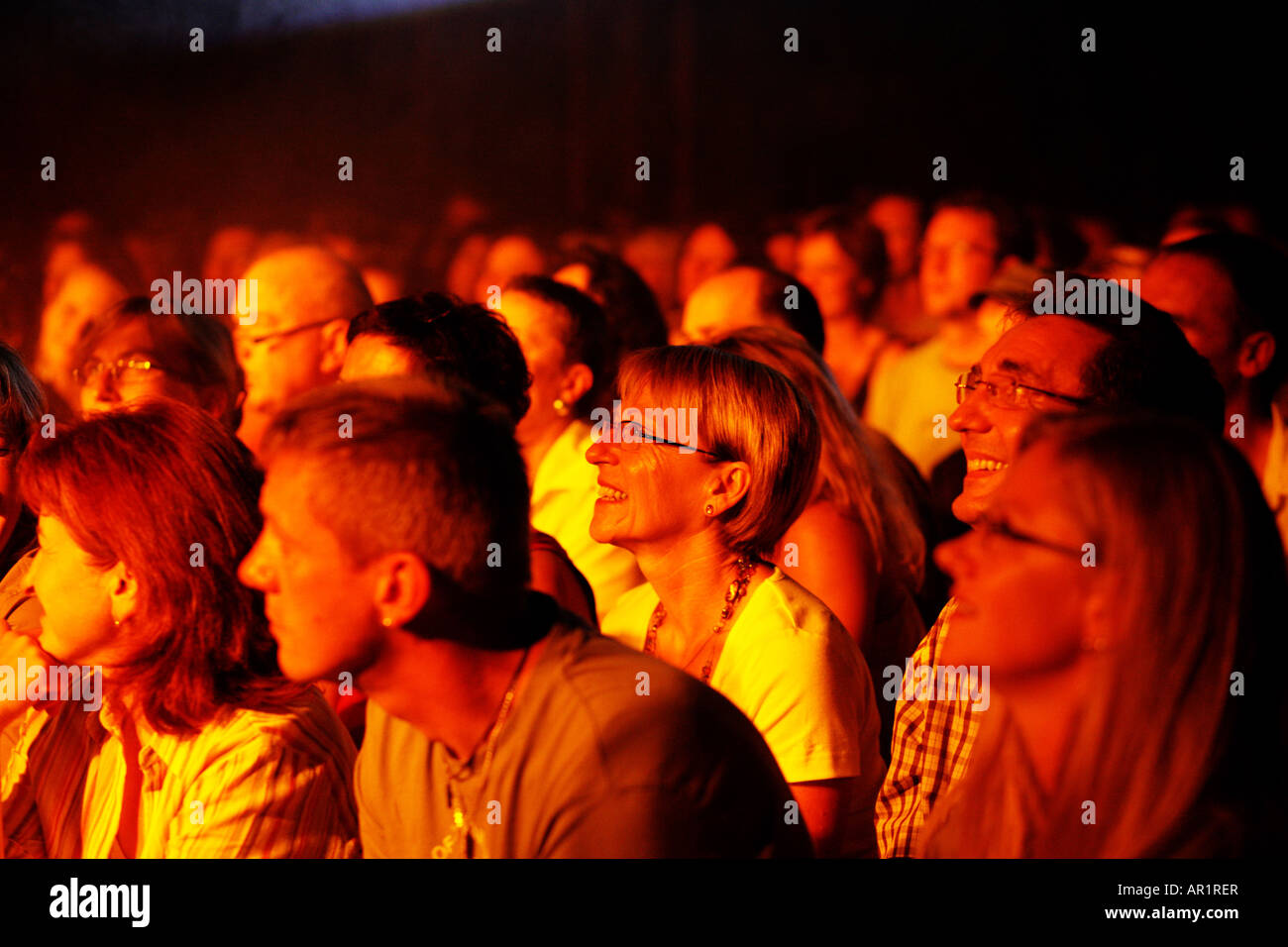 Audience watching a show in a small theatre Stock Photo - Alamy
