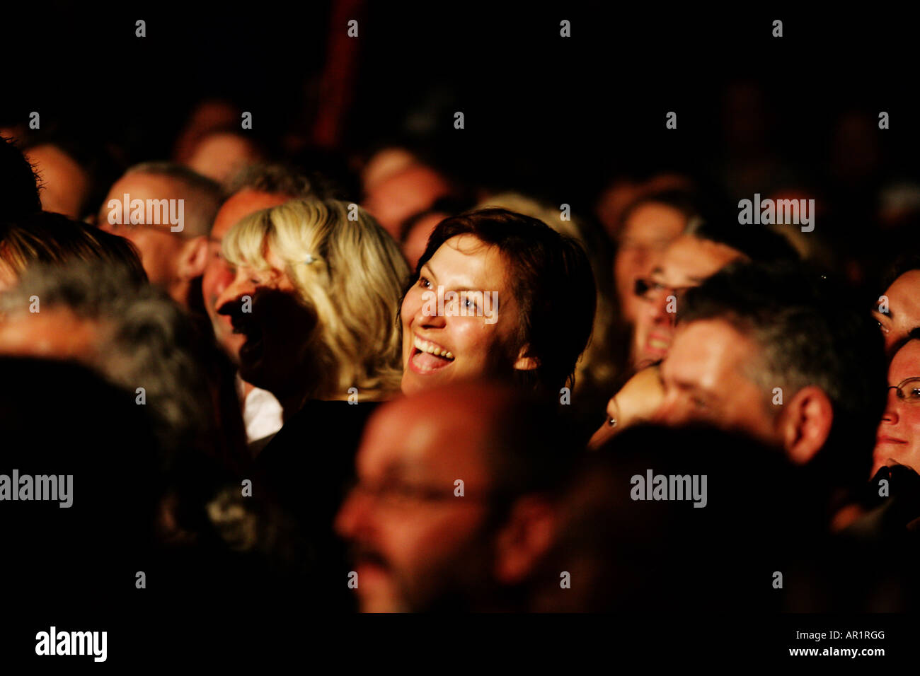 Audience watching a show in a small theatre Stock Photo - Alamy