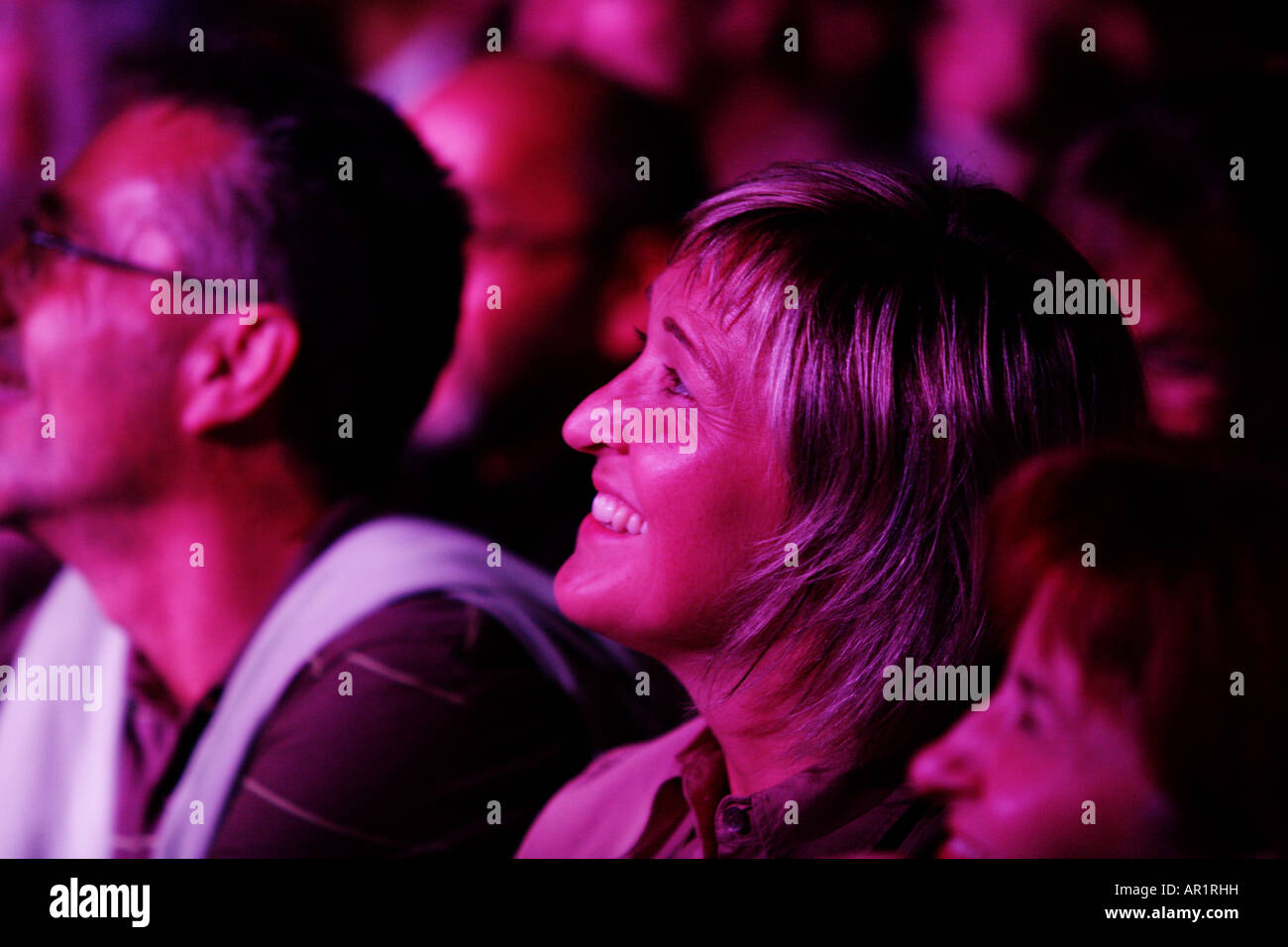 Audience watching a show in a small theatre Stock Photo - Alamy