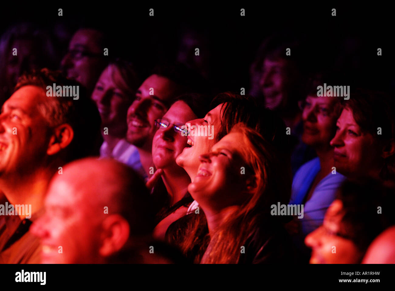 Audience watching a show in a small theatre Stock Photo - Alamy