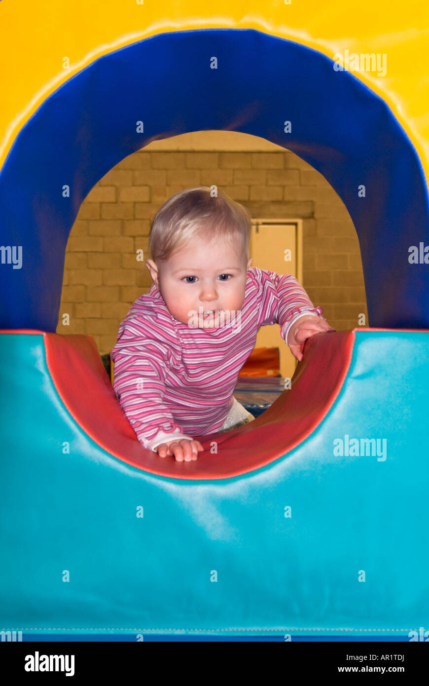 Climbing through a hole hi-res stock photography and images - Alamy