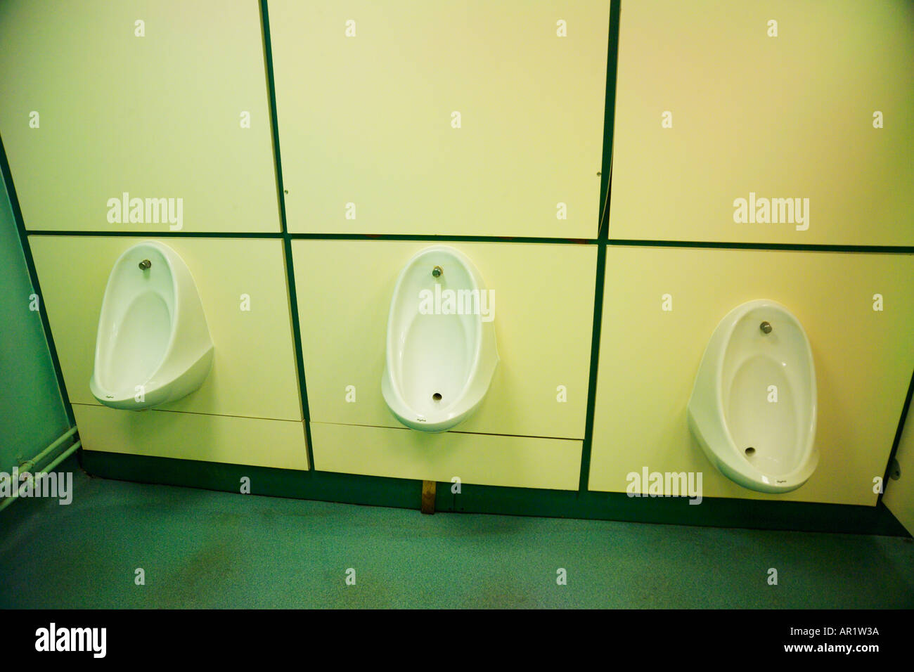 Porcelain urinals hi-res stock photography and images - Alamy