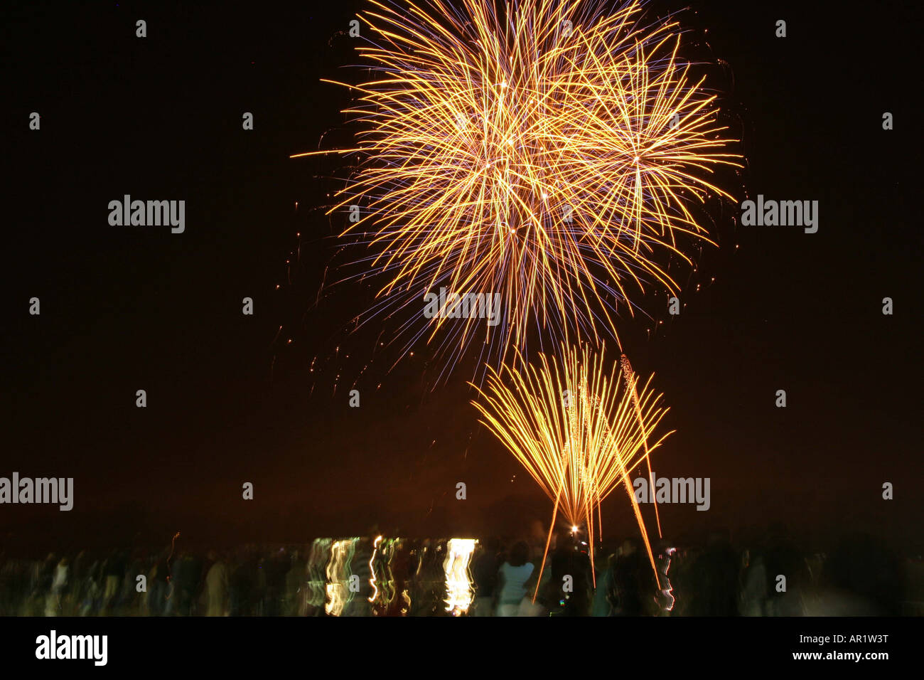 fireworks explode bright in the night sky Stock Photo - Alamy