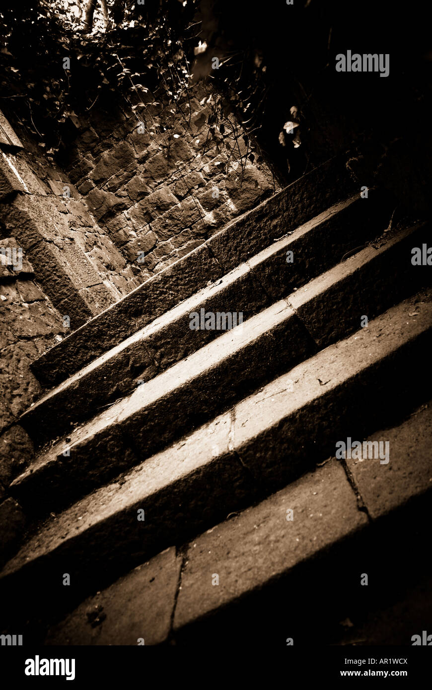 Very old stone steps and stone wall Stock Photo - Alamy