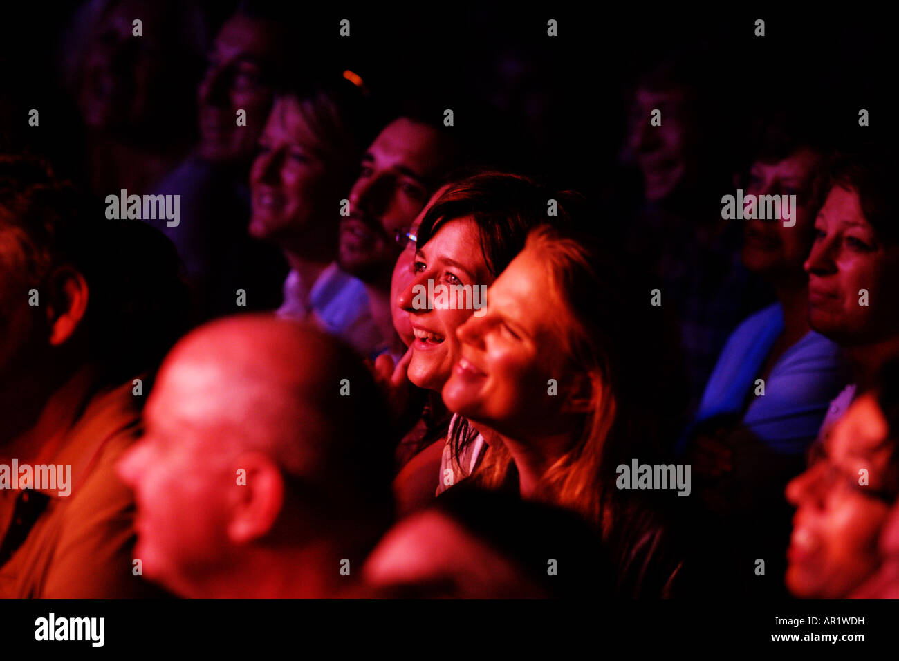 Audience watching a show in a small theatre Stock Photo - Alamy