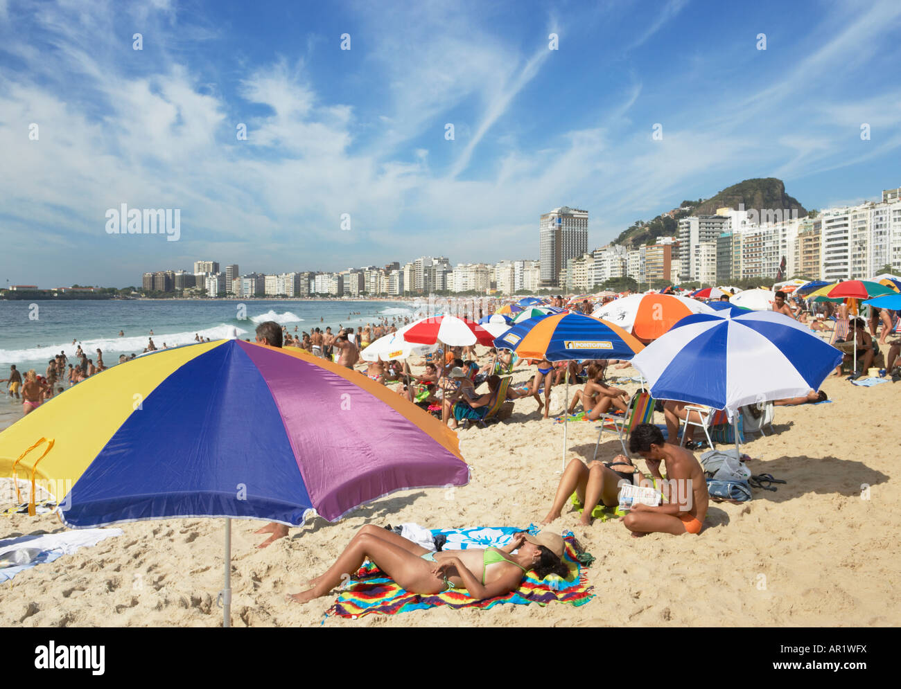 Sunbathing On Copacabana Beach Stock Photos & Sunbathing On Copacabana ...