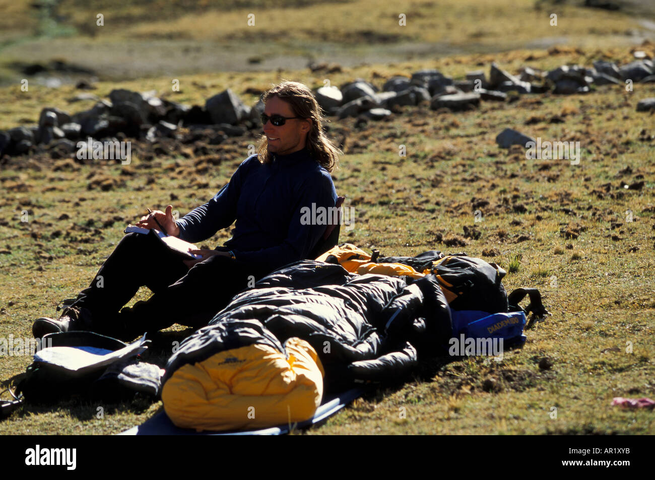Trekker at break, Ancohuma Trekking Bolivia, South America Stock Photo ...