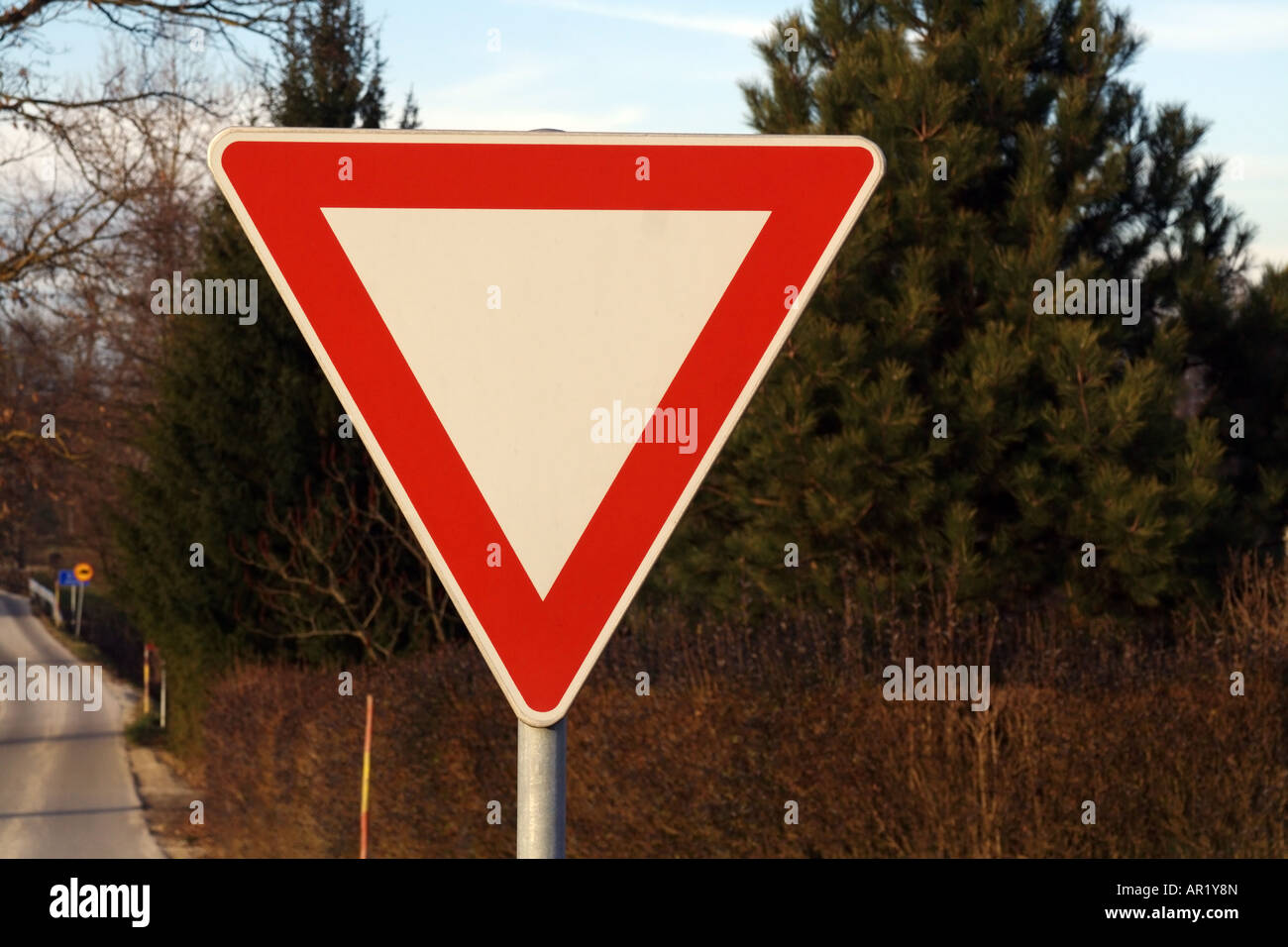Warning road sign by the side of the road Stock Photo - Alamy