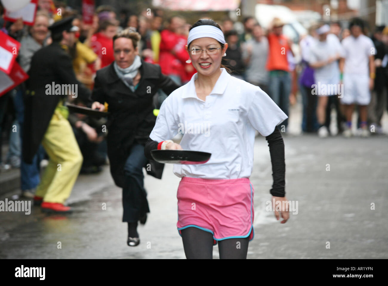 shrove tuesday pancake race spitalfields event Stock Photo - Alamy