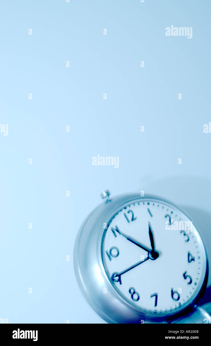 Vertical color image of a retro style clock showing five til one o ...