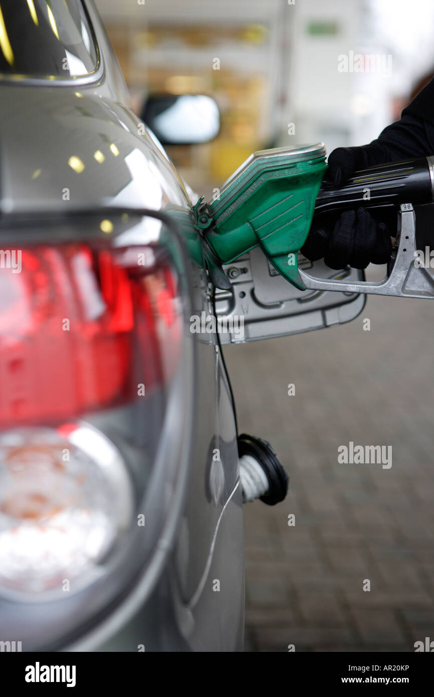 Filling car with petrol Stock Photo - Alamy