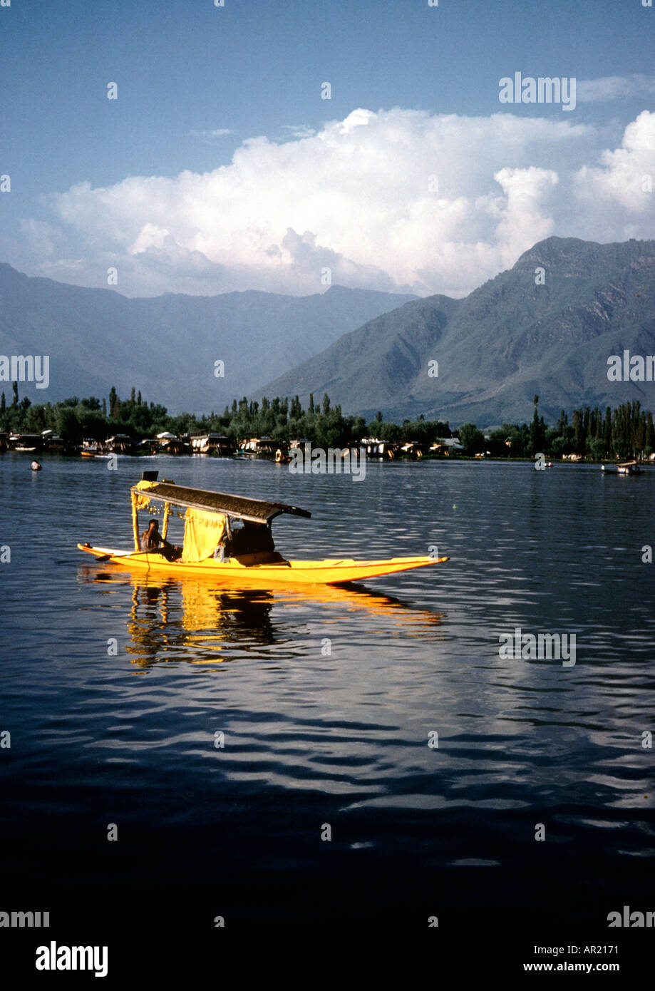 Yellow Shikara On Lake Dal In Kashmir Stock Photo - Alamy