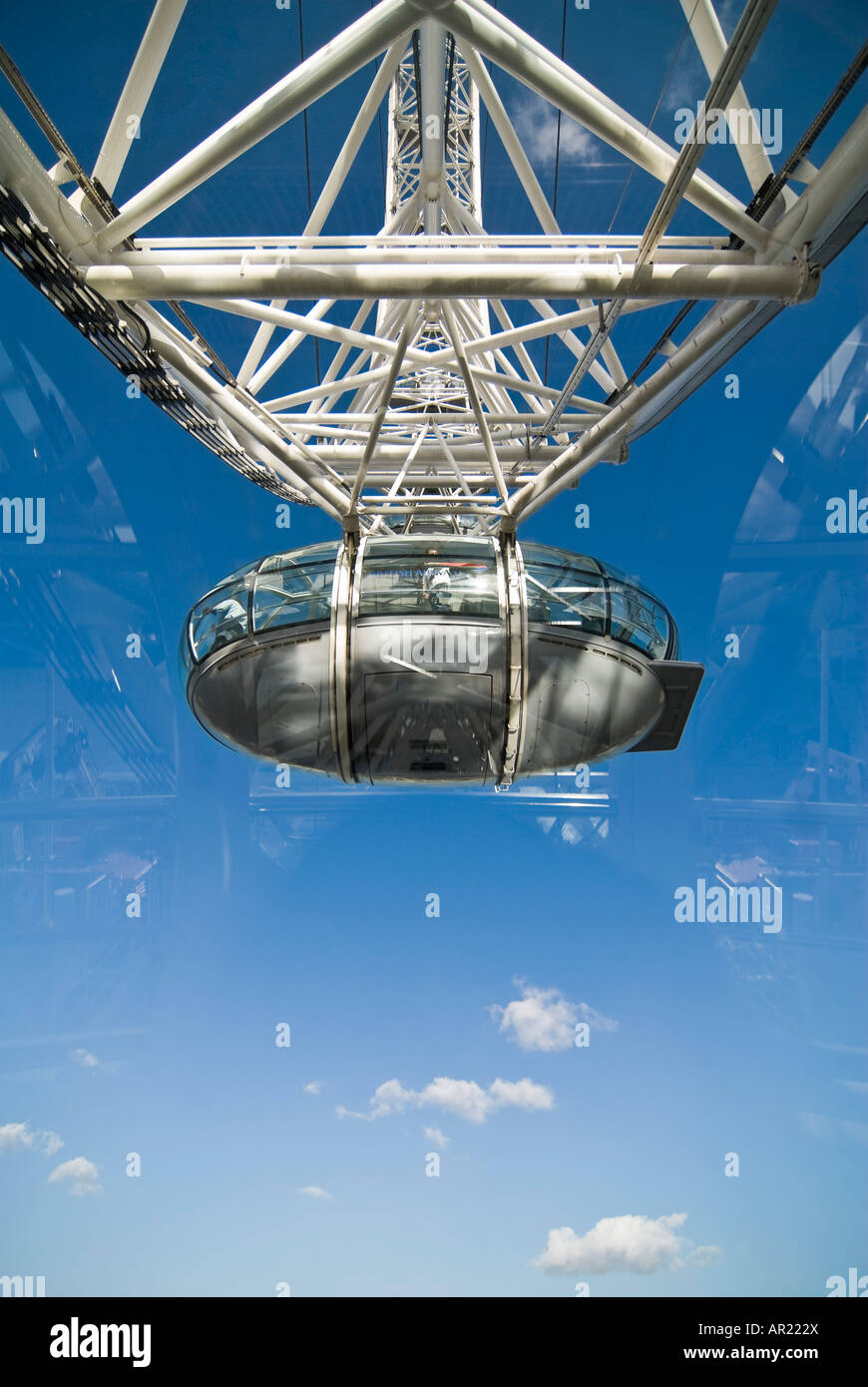 Vertical close up of one pod carrying passengers on a rotation of the ...