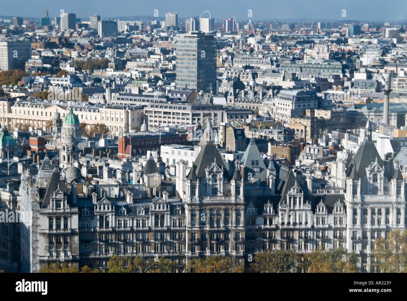 Horizontal wide angle aerial view across the rooftops of central London ...