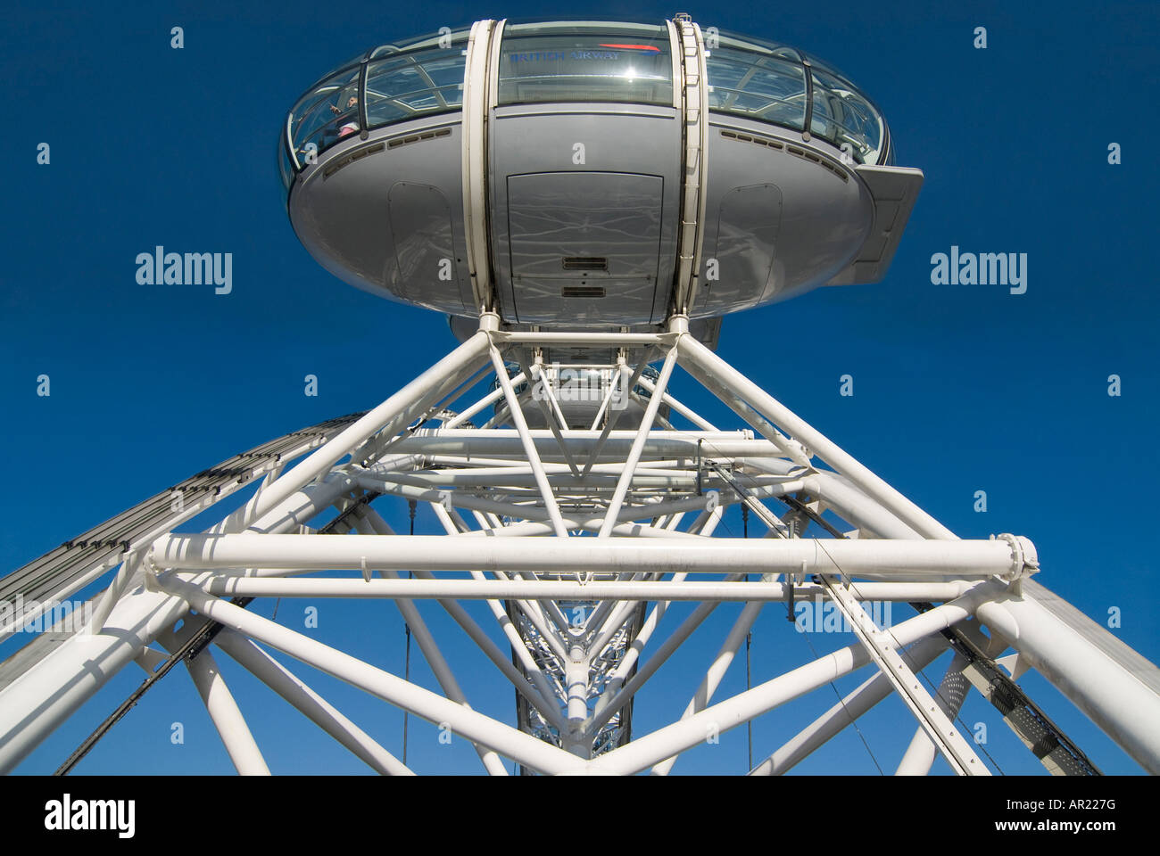 Horizontal close up of one capsule carrying passengers on a rotation of ...