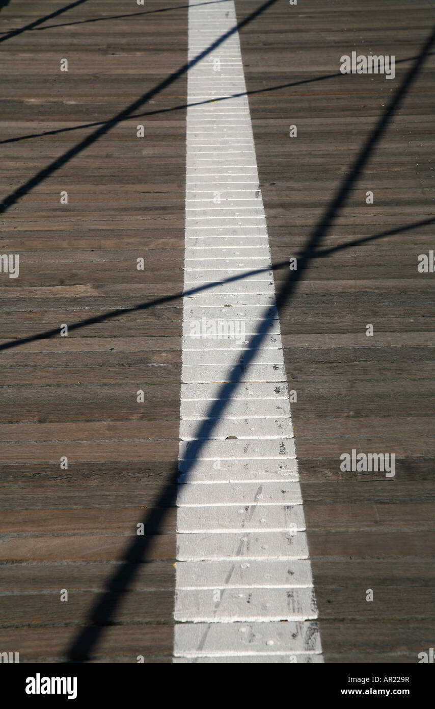 A line on a wooden pathway Stock Photo - Alamy