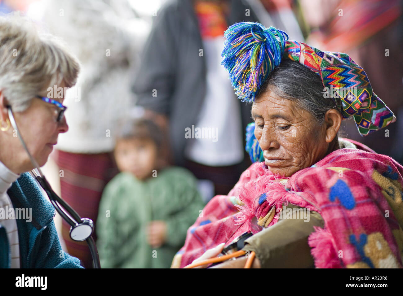 GUATEMALA CAPELLANIA Elderly Maya Ixil woman in colorful traditional ...