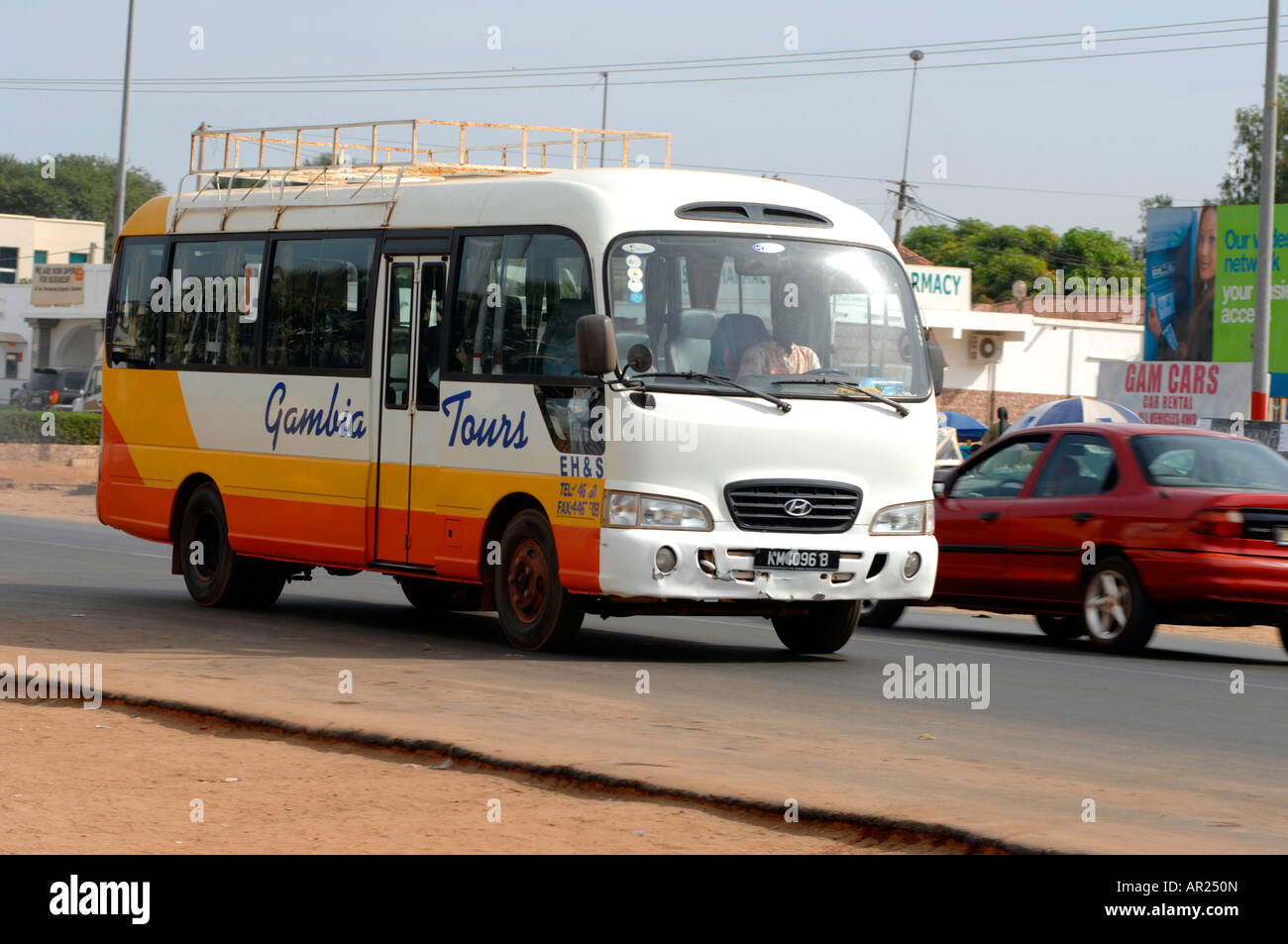 Gambia Tours bus for tourists, The Gambia Stock Photo - Alamy