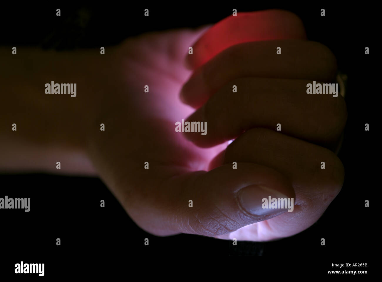Light captured in a closed woman hand Stock Photo - Alamy