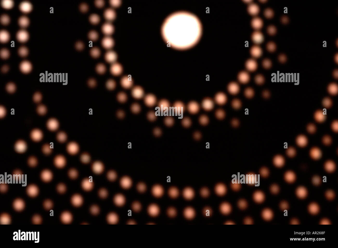 Spotlight on the floor drawing an abstract shape Stock Photo - Alamy